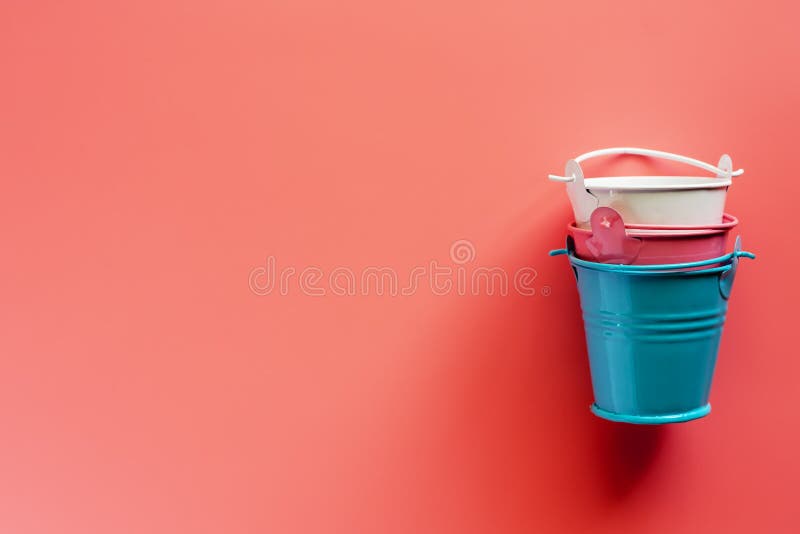 Mini Colored Tin Pail or Bucket on Pink Background Stock Photo - Image ...