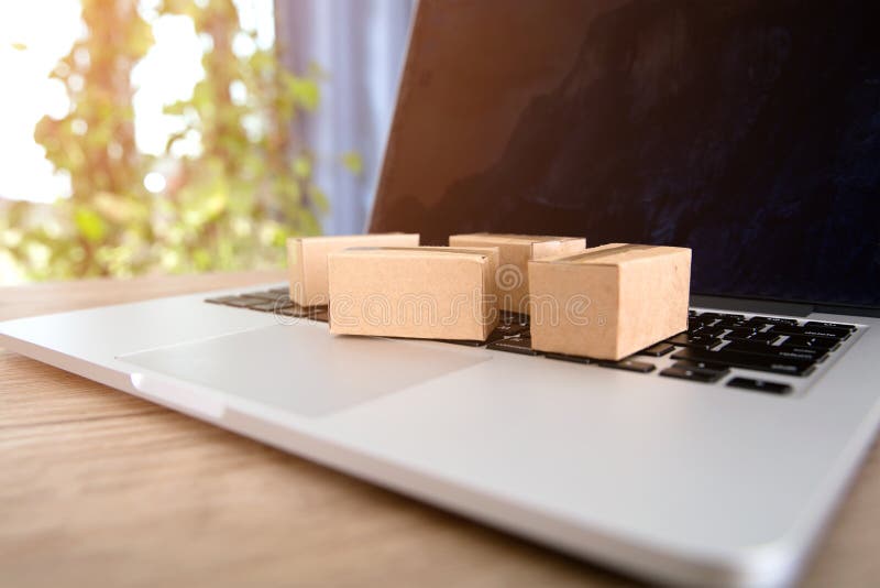 A Mini Courier Box Model is Placed on the Laptop Keyboard Editorial ...