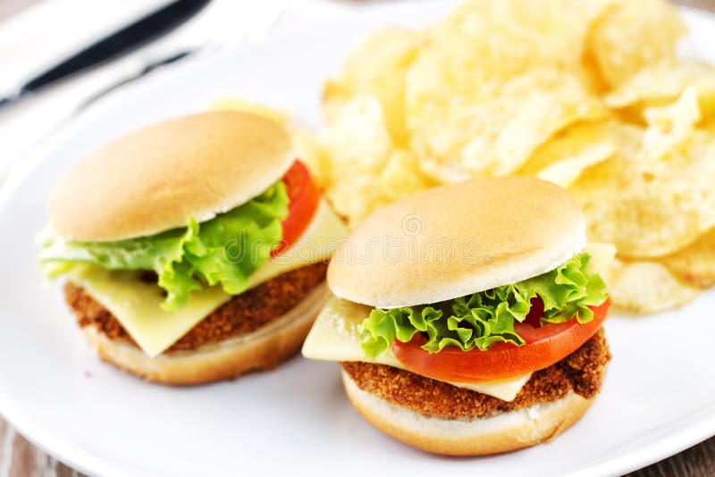 Mini Crispy Chicken Burger with Lettuce Tomato and Cheese. Stock Photo ...