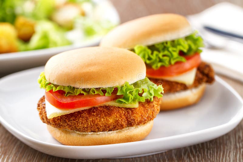 Mini Crispy Chicken Burger with Lettuce Tomato and Cheese. Stock Photo ...