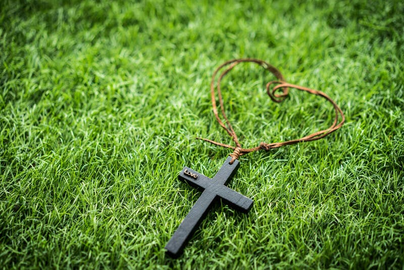 Mini cross stock photo. Image of blue, jesus, grass - 101498410