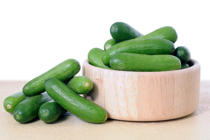 Mini Cucumbers in Wooden Bowl Stock Photo - Image of fruit, vegetable ...