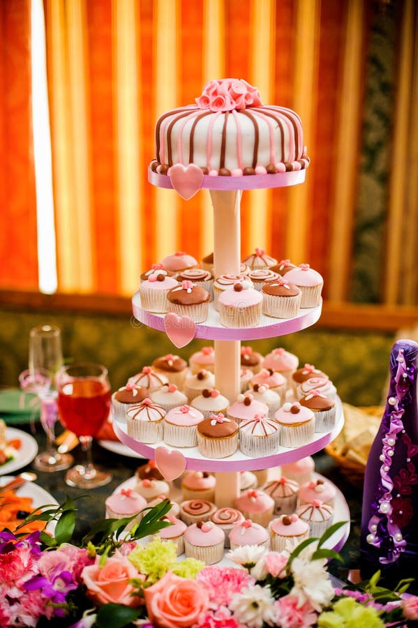 Mini Cupcakes on a Multi Level Tier Stock Photo - Image of delicious ...