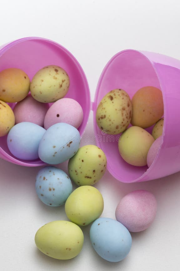 Mini Easter Eggs in an Open Egg Against White. Stock Photo - Image of ...