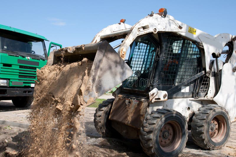 Mini Excavator At Construction Site Stock Photo - Image of metal ...