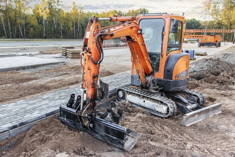 Small or Mini Yellow Excavator Isolated on White Background ...