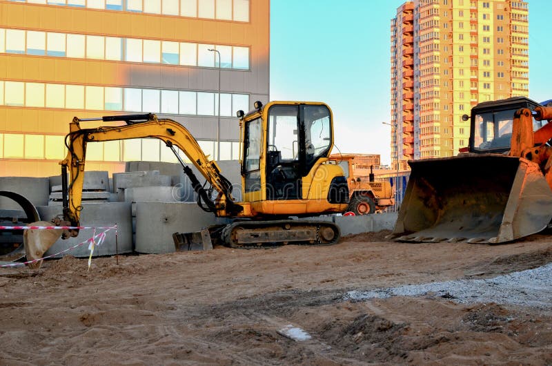 Mini Excavator on a Construction Site Stock Photo - Image of earth ...