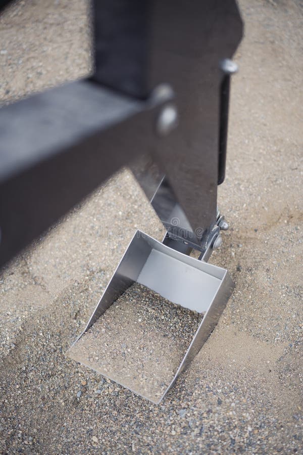 Mini Excavator Lifting Some and with Its Cup Stock Image - Image of ...