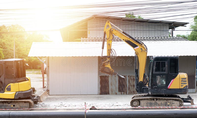 A Mini Excavator is Working on a Construction Site Stock Image - Image ...