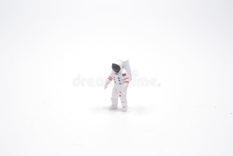 A Mini Figure of the Astronaut in a Space Suit Stock Image - Image of ...