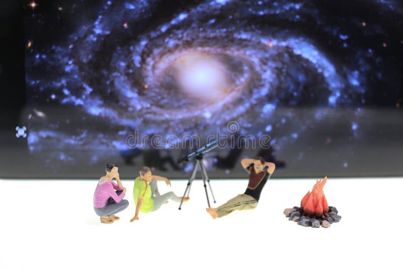 A Mini Figure of Astronomer with a Telescope Watching the Stars Stock ...