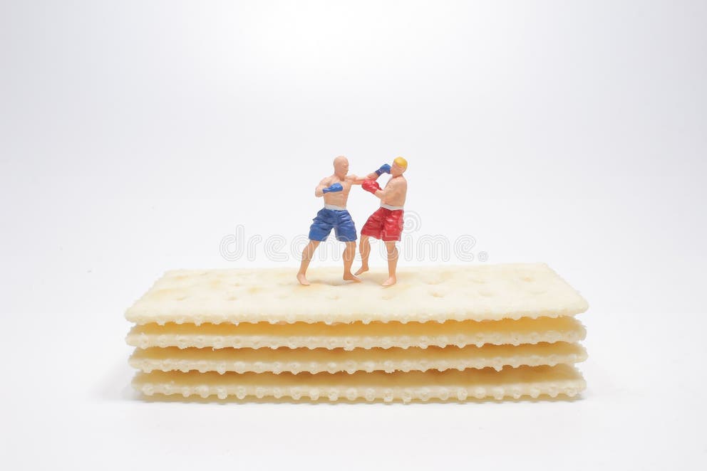 A Mini Figure Boxers in Action on Crackers Stock Photo - Image of ...
