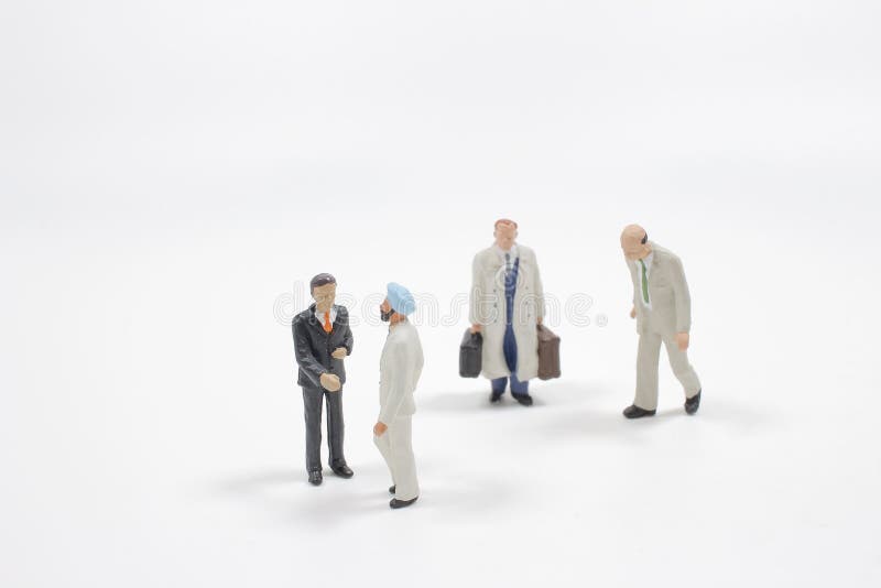 A Mini Figure of Business Standing with Team Stock Photo - Image of ...