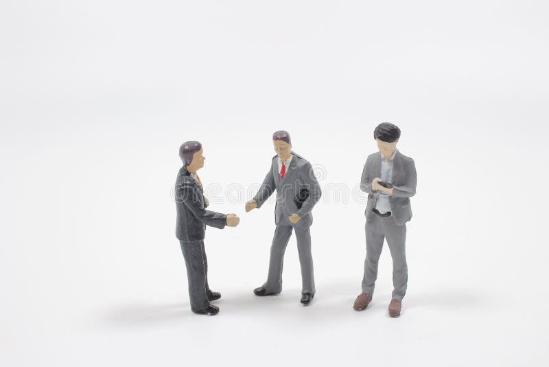 A Mini Figure of Business Standing with Team Stock Photo - Image of ...