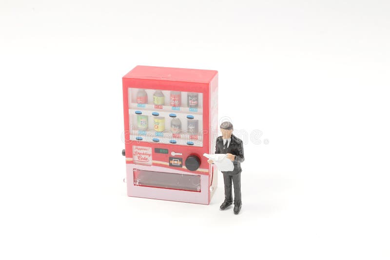 A Mini Figure Buy Drinks from Vending Machines Stock Photo - Image of ...