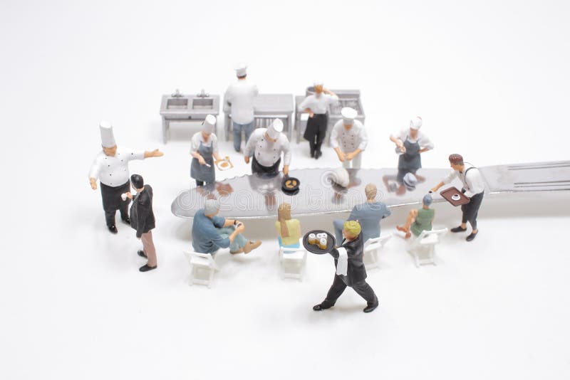 A Mini Figure Chef Cooking Teppanyaki on Kinfe Stock Photo - Image of ...