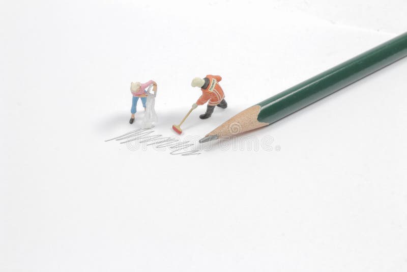 The Mini Figure Clear the Pencil Writing on Paper Stock Photo - Image ...