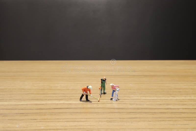 A Mini Figure are Clearing the Work Stock Image - Image of road ...