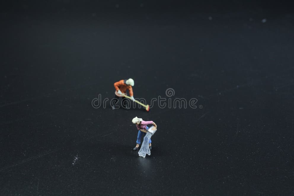 A Mini Figure are Clearing the Work Stock Image - Image of miniature ...
