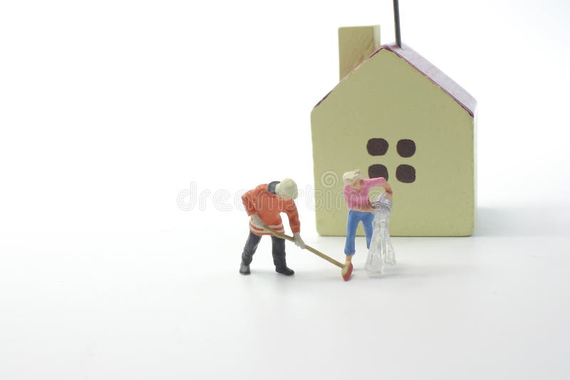 A Mini Figure are Clearing the Work Stock Photo - Image of security ...