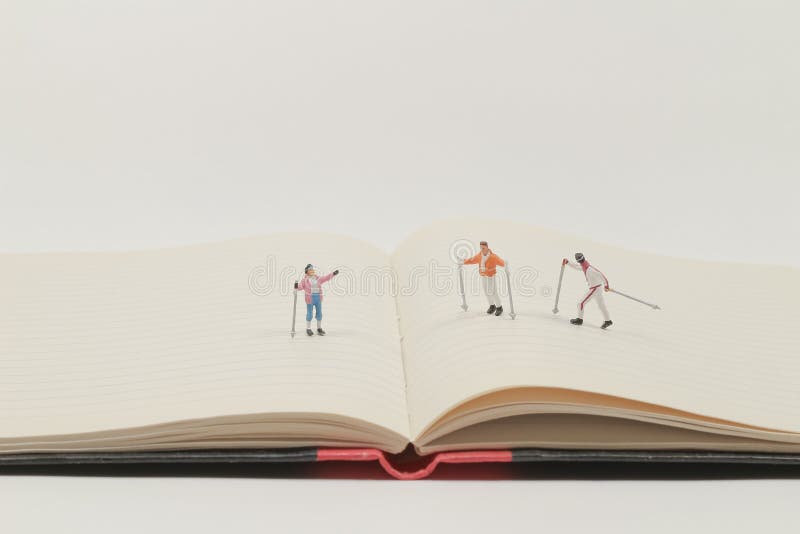 A Mini Figure of the Clip on the Book Stock Image - Image of season ...