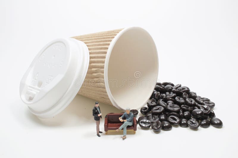 A Mini of Figure with the Coffee and Paper Mug Stock Photo - Image of ...