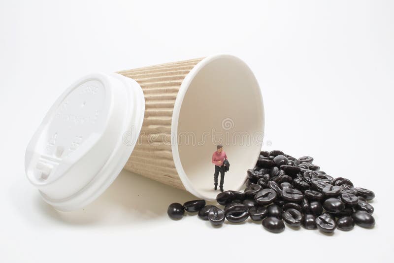 A Mini of Figure with the Coffee and Paper Mug Stock Image - Image of ...