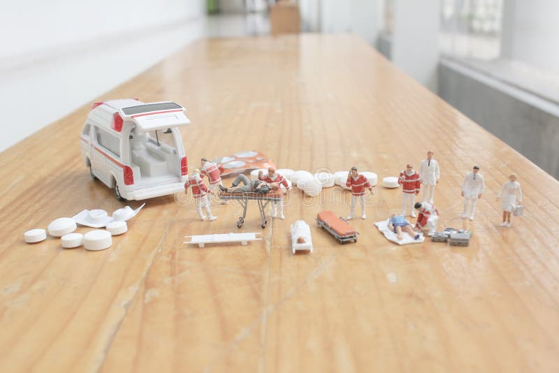 The Mini Figure of First Aid at Ambulance Stock Photo - Image of tiny ...