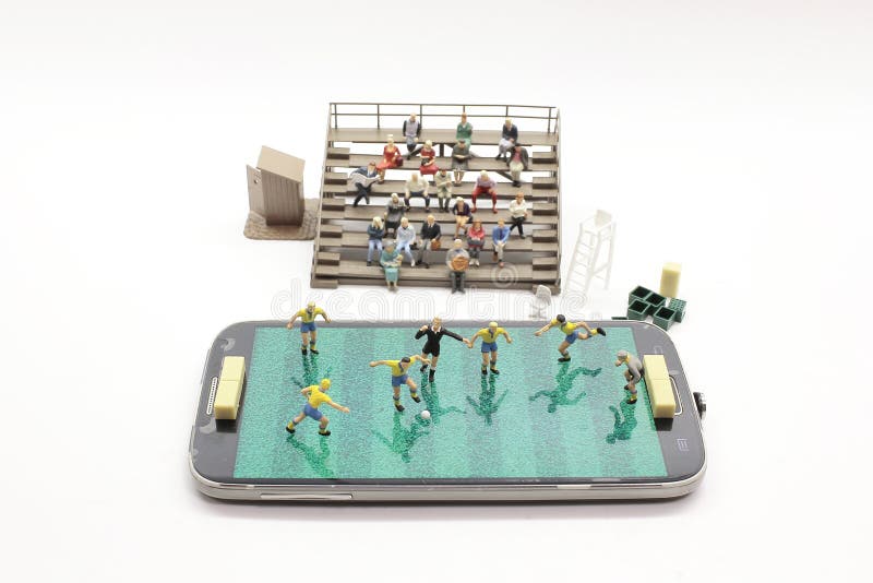Mini Figure Football Team Plaing on Mobile Phone Stock Photo - Image of ...