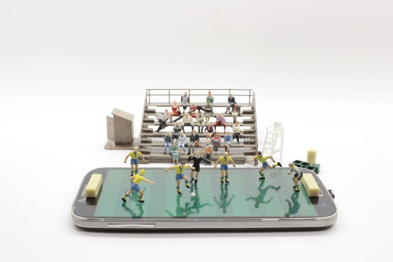 Mini Figure Football Team Plaing on Mobile Phone Stock Image - Image of ...