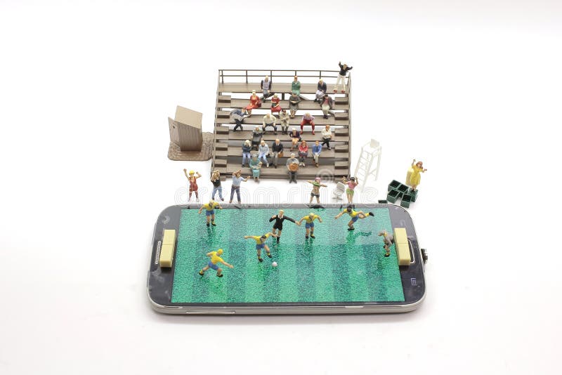 Mini Figure Football Team Plaing on Mobile Phone Stock Image - Image of ...
