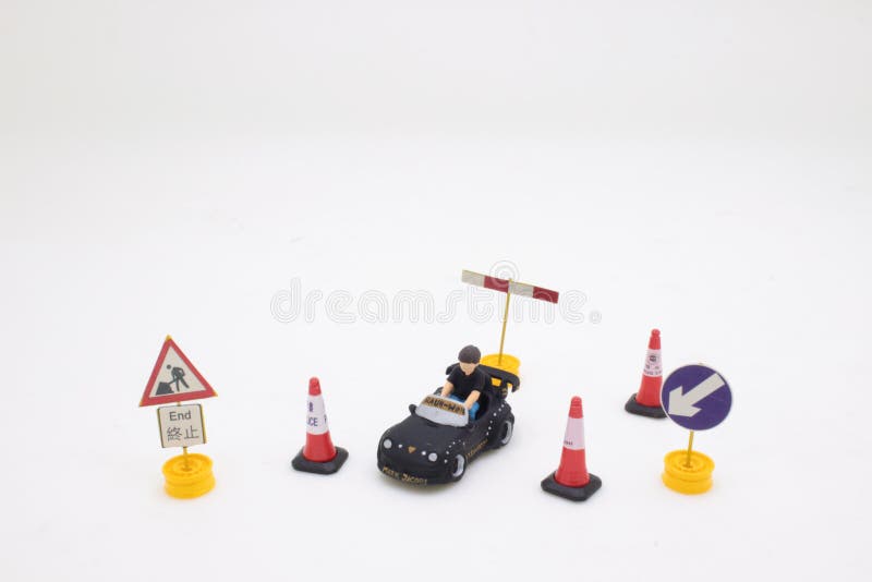 A Mini of Figure Learn the Drive with Road Sign Editorial Stock Image ...