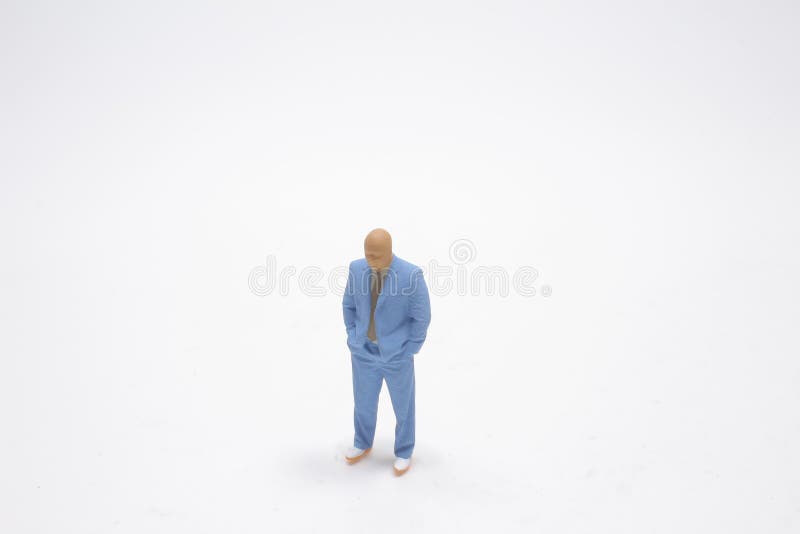 A Mini Figure of Man with Blue Business Suit Stock Image - Image of ...