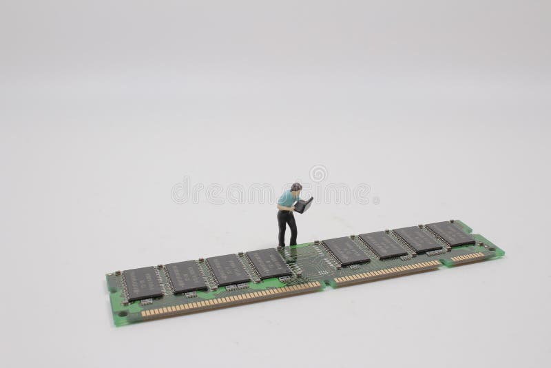 The Mini Figure Man Using a Laptop on Ram Stock Photo - Image of ...