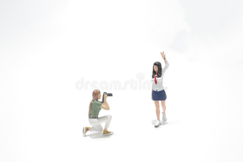 A Mini Figure Model on Photo Shoting Stock Photo - Image of shoot ...