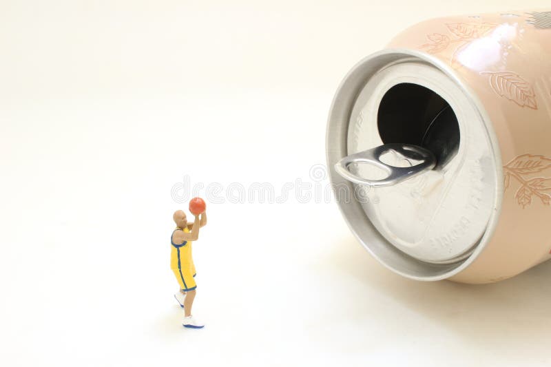 The Mini Figure Play the Basketball with Soda Can Stock Image - Image ...