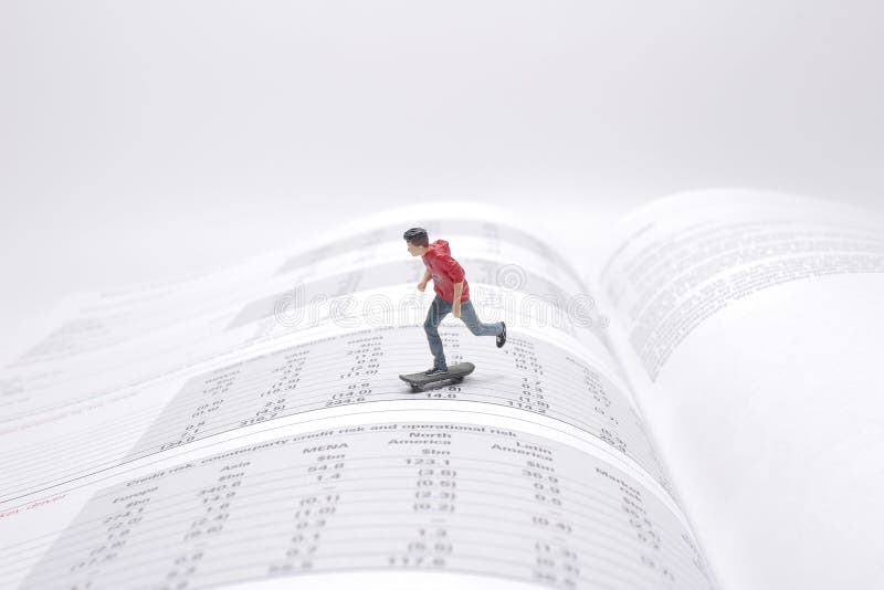 A Mini Figure Play the Skateboard on Book Stock Photo - Image of ...