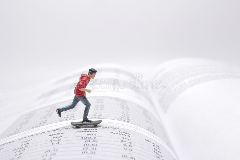 A Mini Figure Play the Skateboard on Book Stock Photo - Image of ... A Mini Figure Play the Skateboard on Book Stock Photo - Image of ...