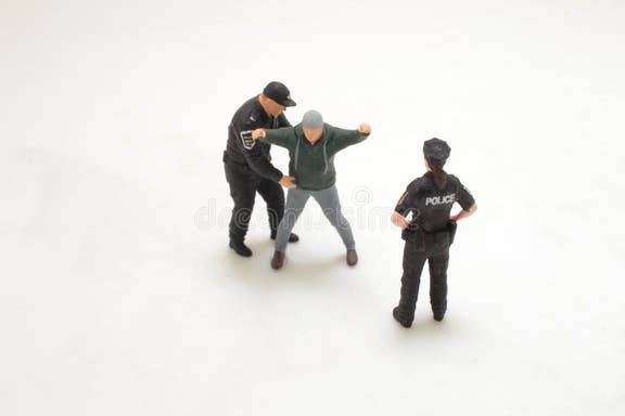 A Mini of Figure, Policeman Catch Thief Stock Photo - Image of crime ...