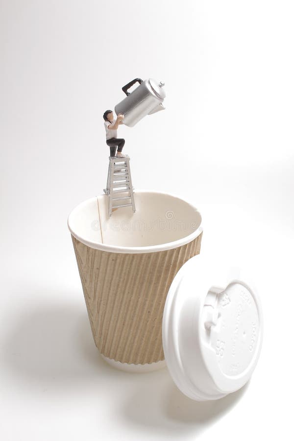 A Mini Figure Pouring Hot Coffee from the Coffee Pot into Mug Stock ...