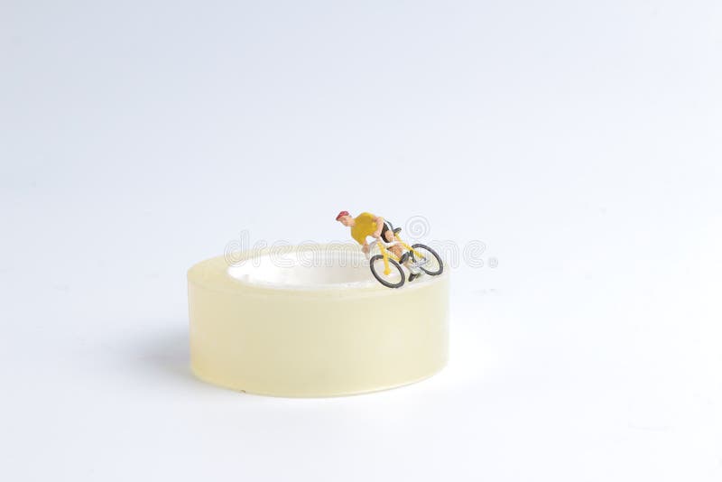 Mini Figure Ride Bicycle Isolated on Tape Stock Photo - Image of active ...