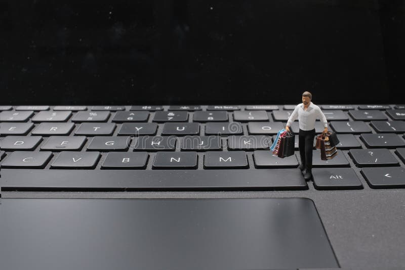 The Mini of Figure Shopping Online by Laptop Stock Photo - Image of ...