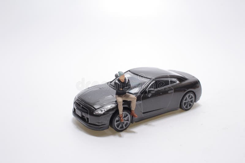 The Mini Figure Sit in Front of a Car Stock Image - Image of driver ...