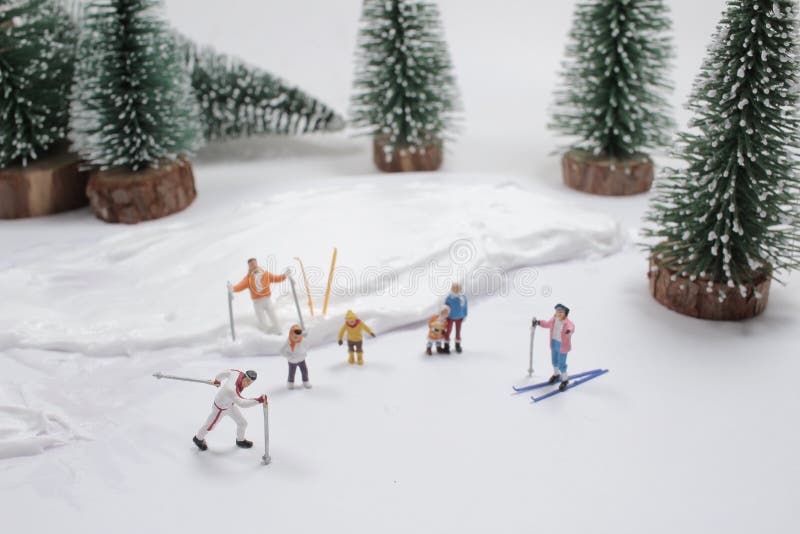 A Mini Figure Skiers Enjoy the Winter Fun Stock Image - Image of person ...