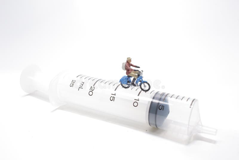 A Mini of Figure on a Syringe Stock Image - Image of speed, transport ...