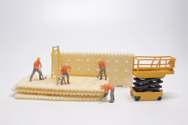A Mini Figure Work on the Crackers Stock Image - Image of salted ...
