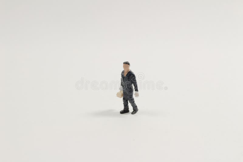 A Mini Figure of Worker are Working Stock Image - Image of engine ...