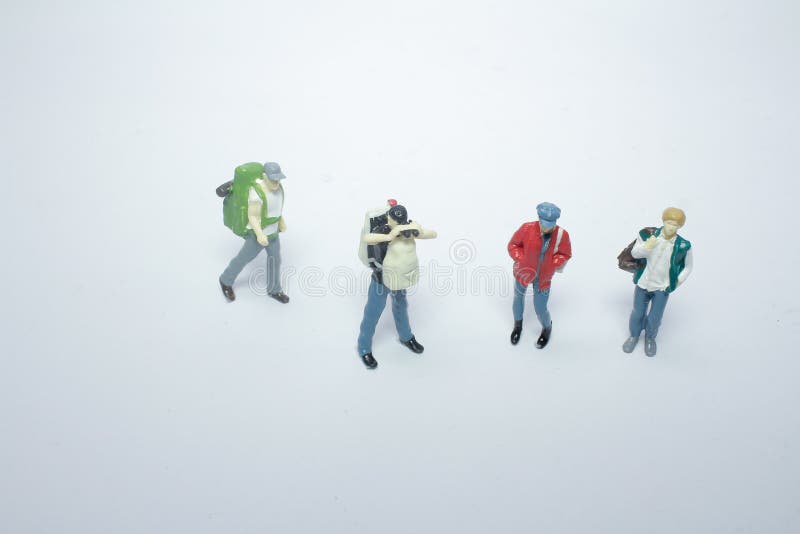 A Mini Figures with Backpack at Board Stock Image - Image of tourism ...