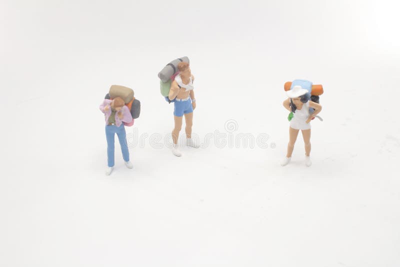 A Mini Figures with Backpack at Board Stock Photo - Image of miniature ...