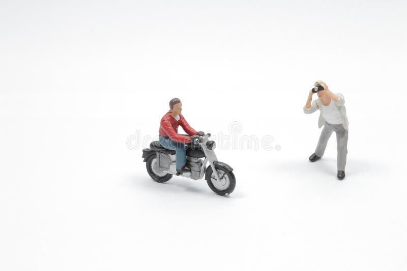 A Mini Figurine Character As Photographer Standing Stock Image - Image ...